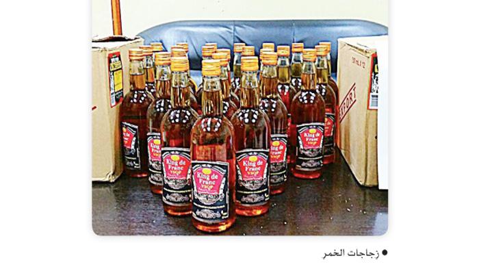 زجاجات خمر مستوردة في ساحة ترابية